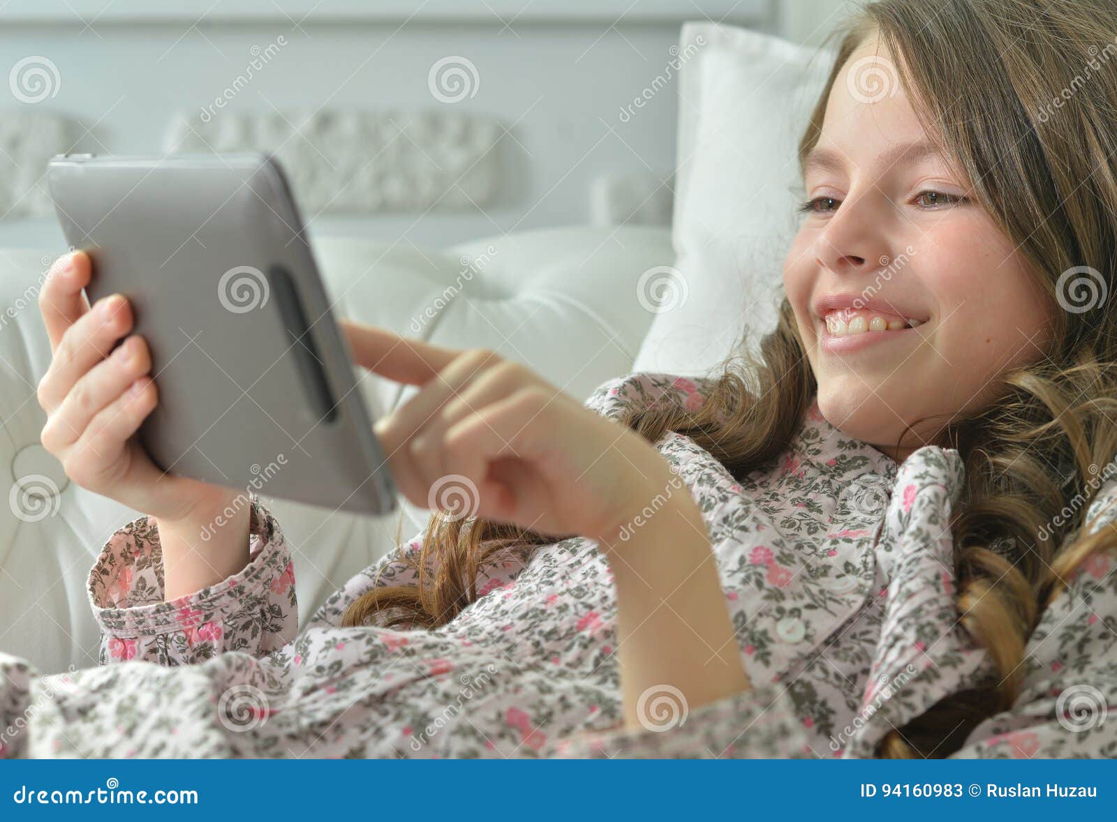 Little girl using tablet stock image. Image of research - 94160983