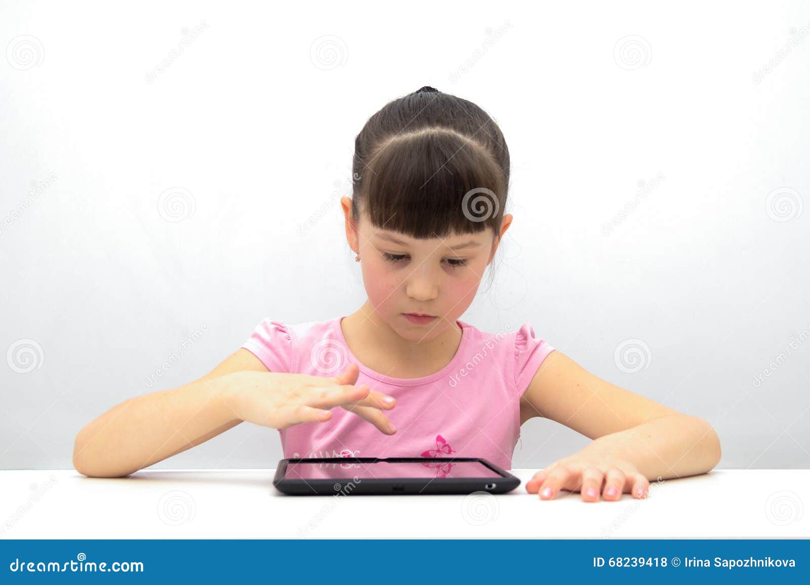 Little Girl Using a Tablet Pc Stock Photo - Image of childhood ...