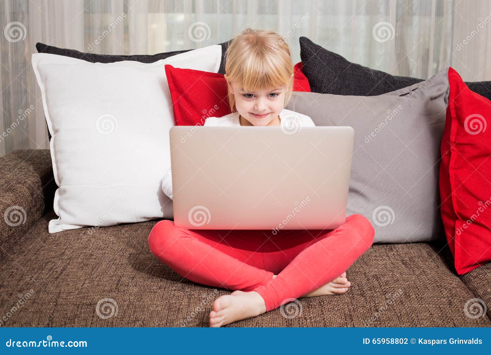 Little Girl Watching Something in Computer Stock Photo - Image of ...