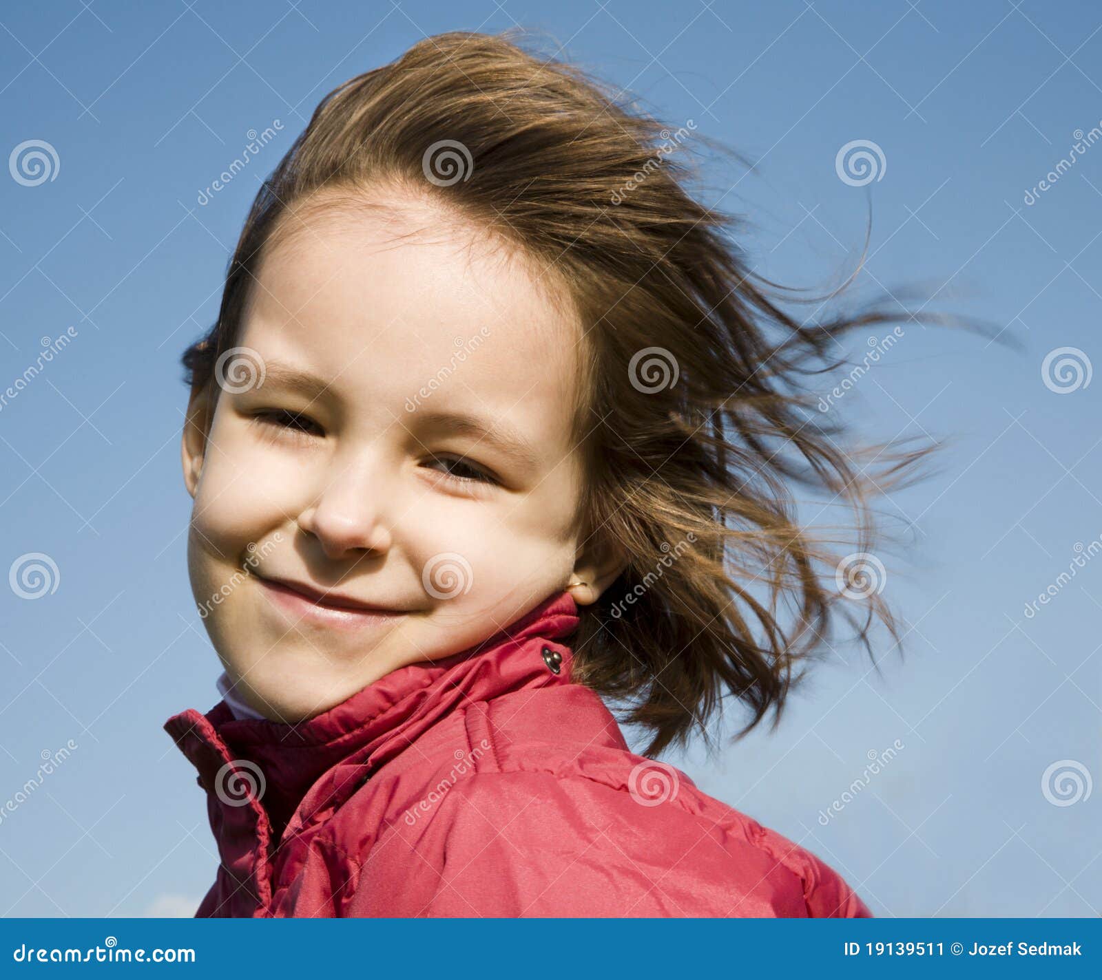 Little girl in the wind stock image. Image of enjoyment - 19139511