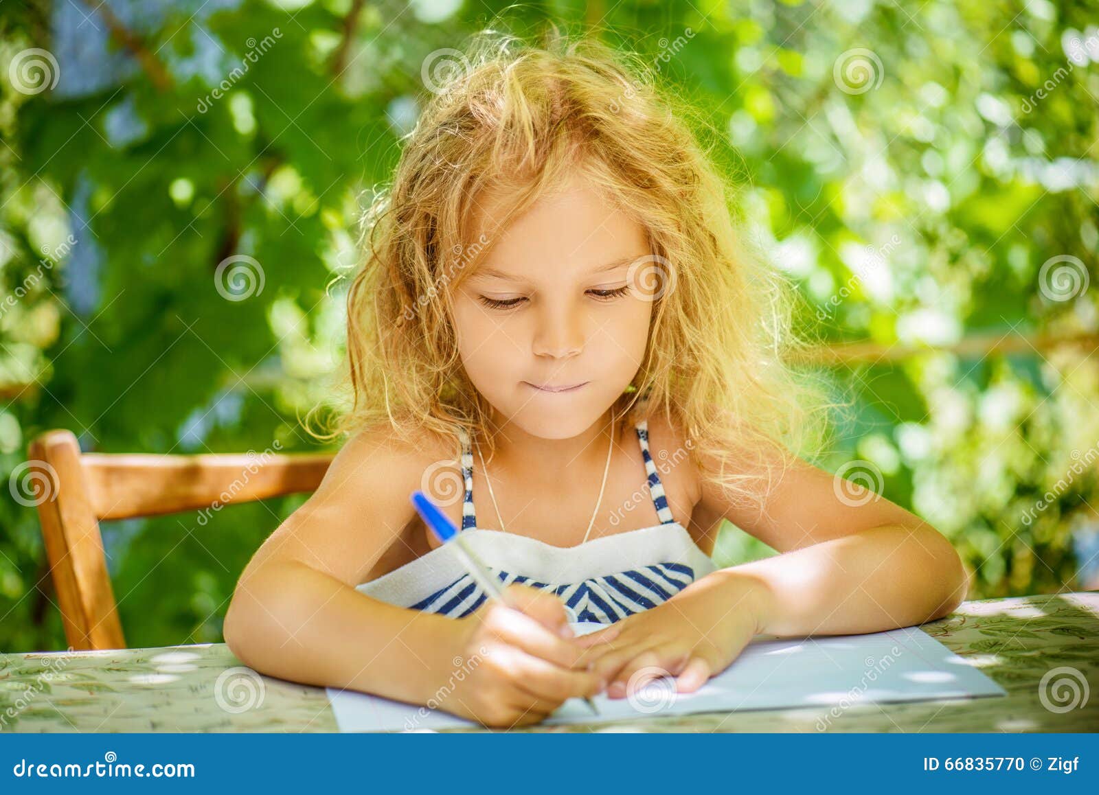 Little Girl Writes Pen in Notebook Stock Photo - Image of elementary ...