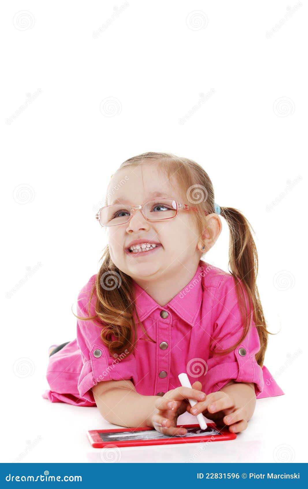 A little girl writing. stock photo. Image of looking - 22831596