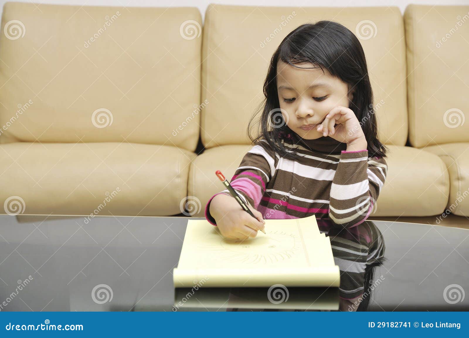 Little Girl Writing stock image. Image of couch, pencil - 29182741