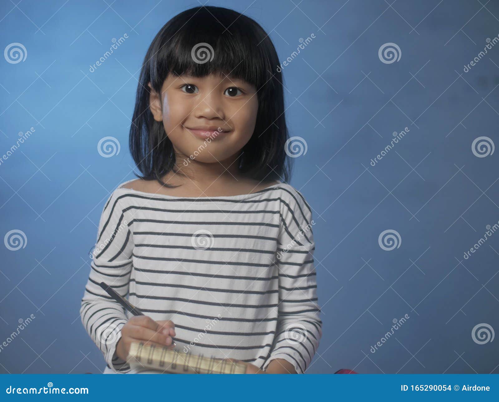Little Girl Writing on Notepad Stock Photo - Image of coloring ...