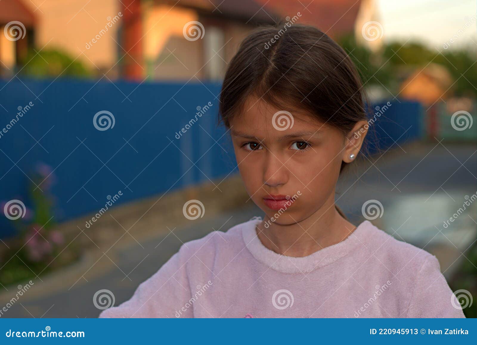 Little girl in the yard stock image. Image of nportrait - 220945913