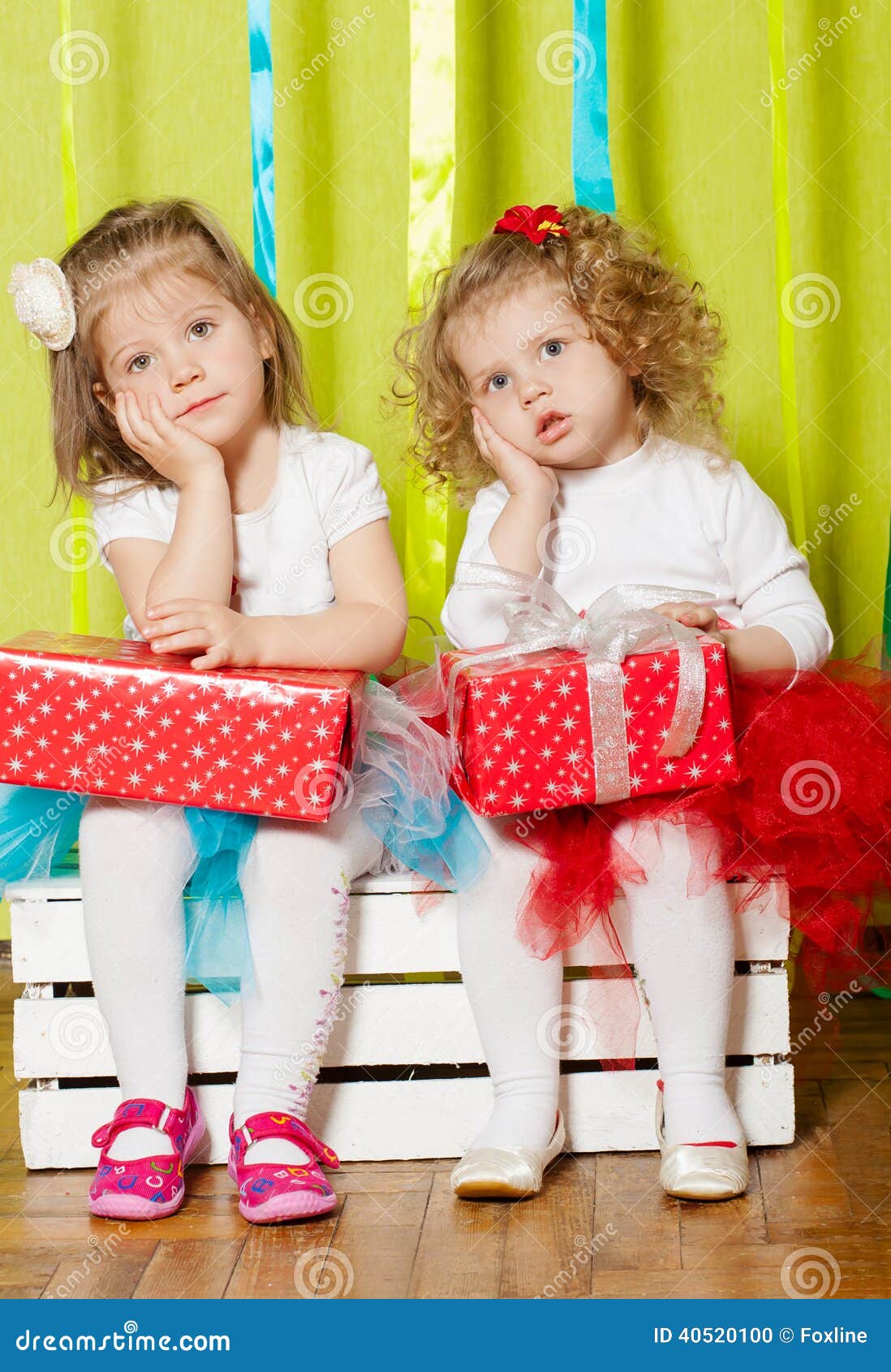 Little Girls in Fluffy Skirts with Gift Boxes Stock Photo - Image of ...
