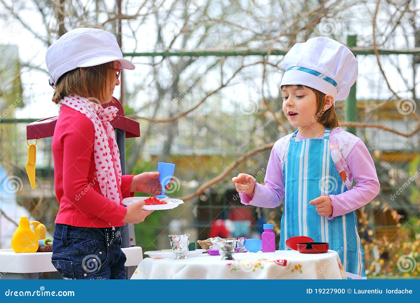 Little Girls Having Fun Playing Cooking Stock Photo - Image of food ...