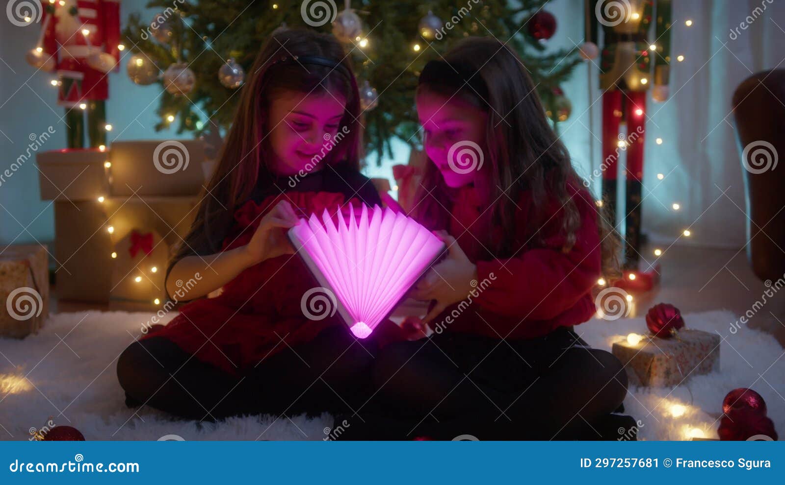 Little Girls Opening a Magic Book with Light Stock Video - Video of ...