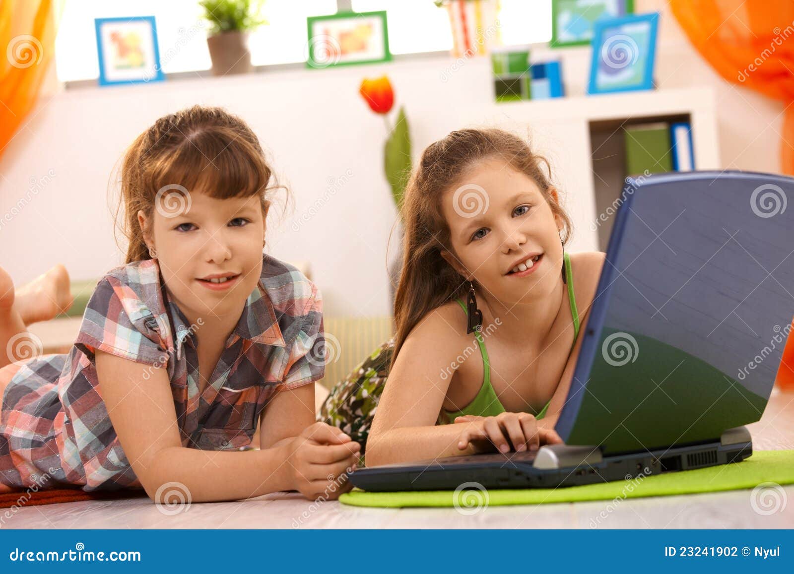 Little Girls Playing on Computer at Home Stock Photo - Image of ...