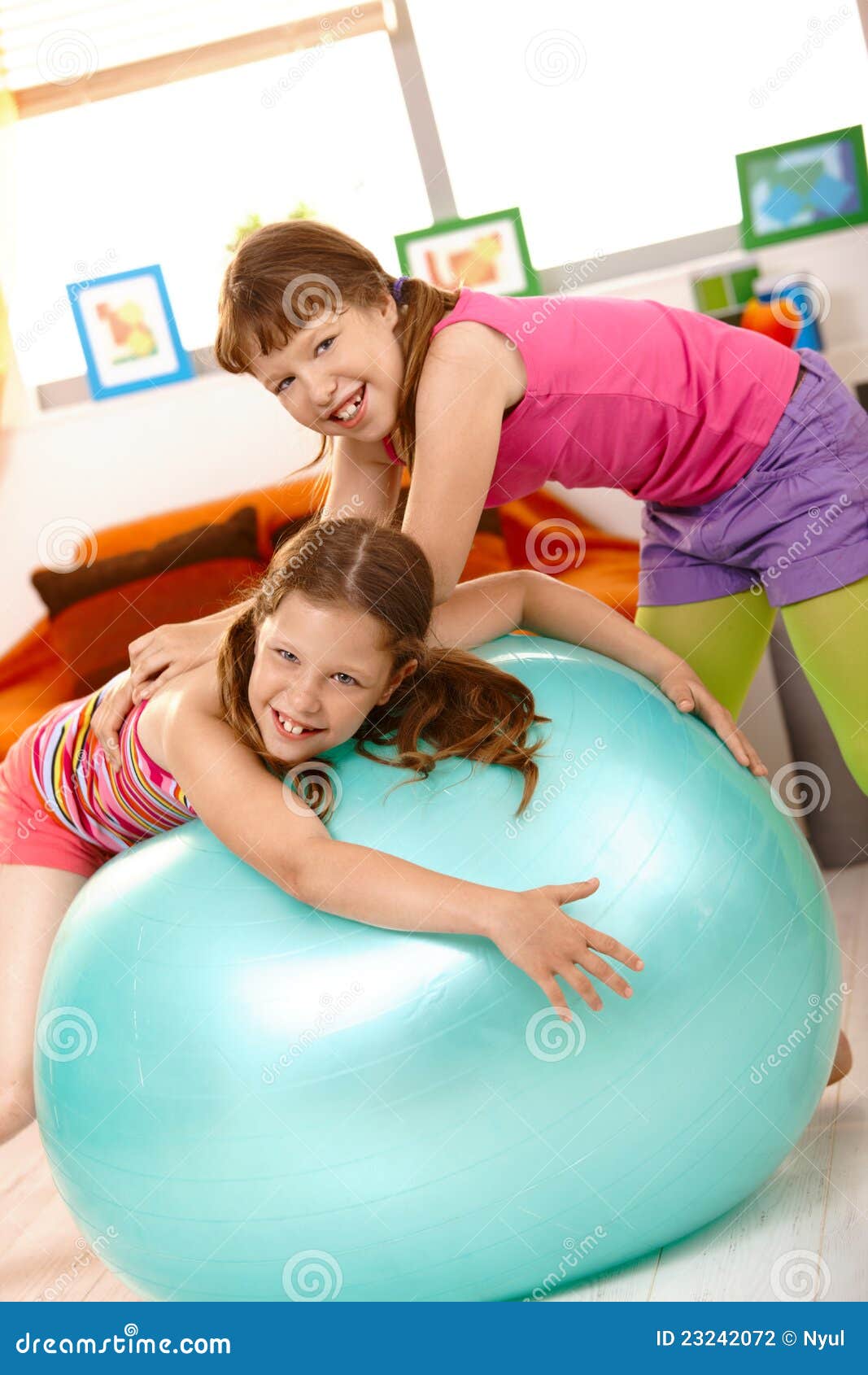 Little Girls Playing with Exercise Ball Stock Photo - Image of cosy ...