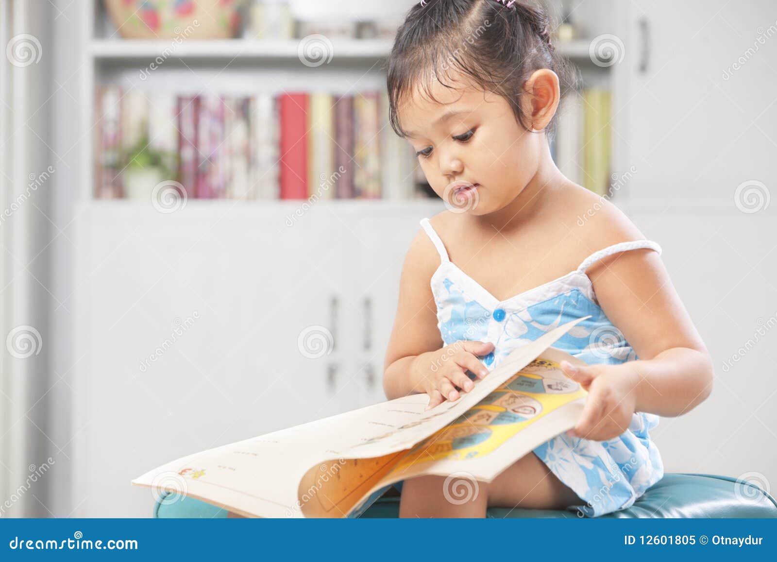 Little girls reading book stock image. Image of young - 12601805