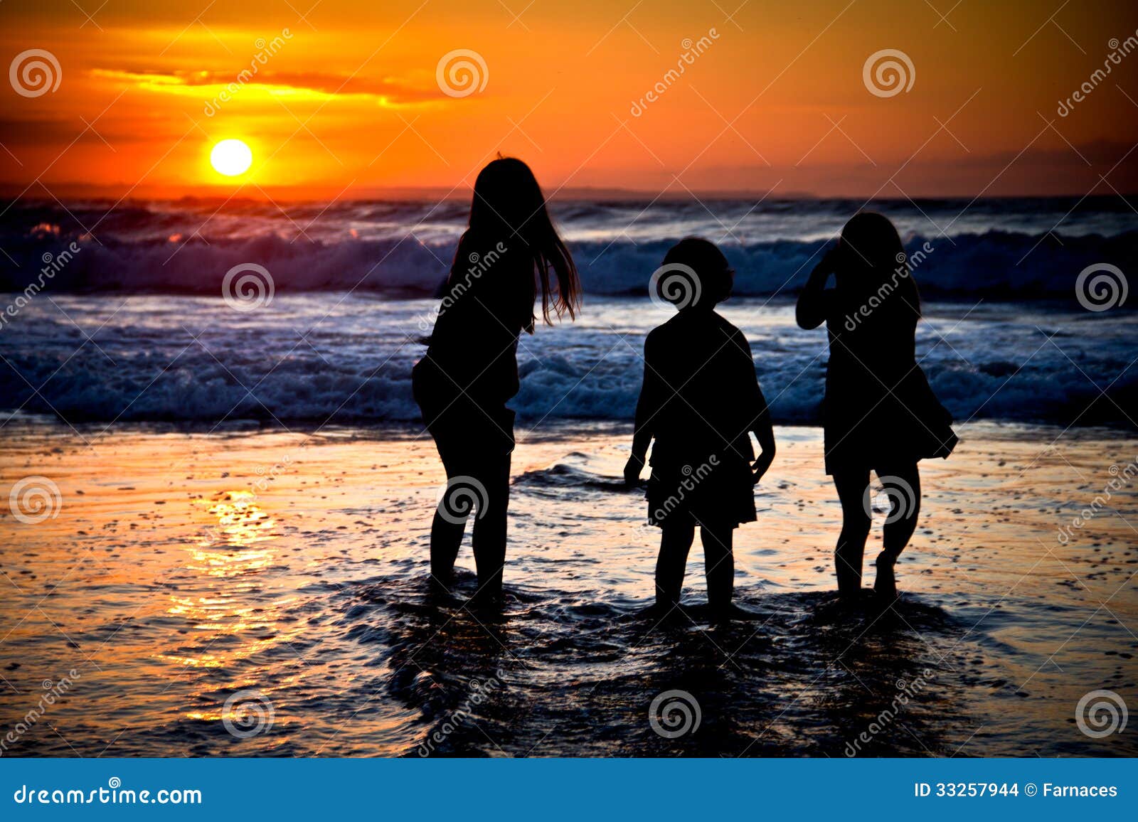 Little girls in a sunset stock photo. Image of sand, happy - 33257944