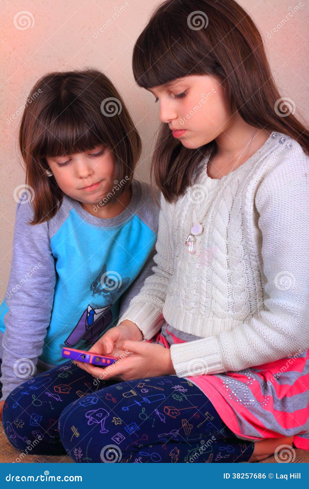 Little Girls Texting stock photo. Image of hair, sending - 38257686