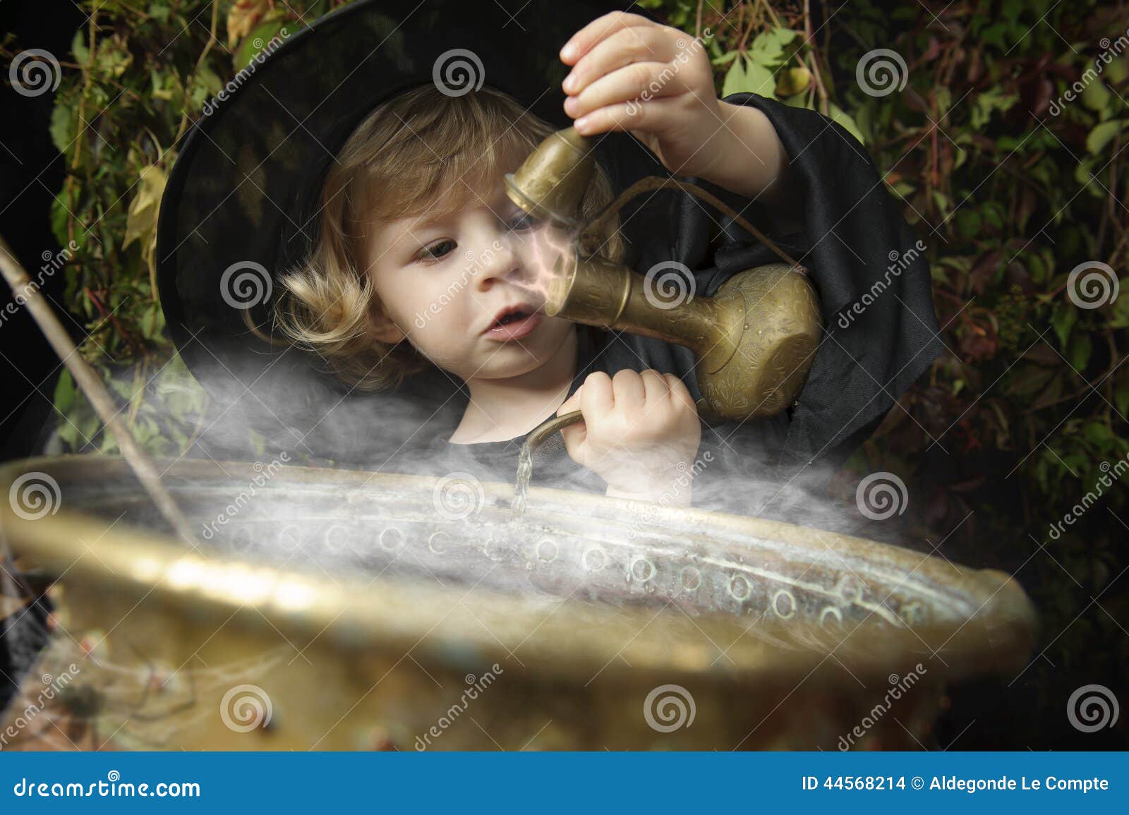 Little Halloween Witch with Cauldron Stock Photo - Image of child ...