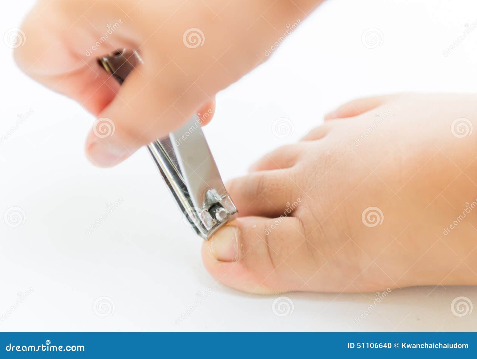 Little Hand Cutting His Toenails Stock Photo - Image of object ...