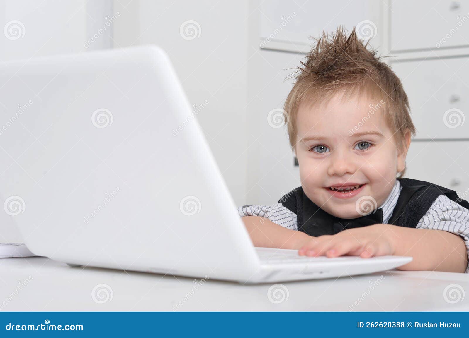 Little Handsome Boy Sits with a Computer Stock Photo - Image of sitting ...