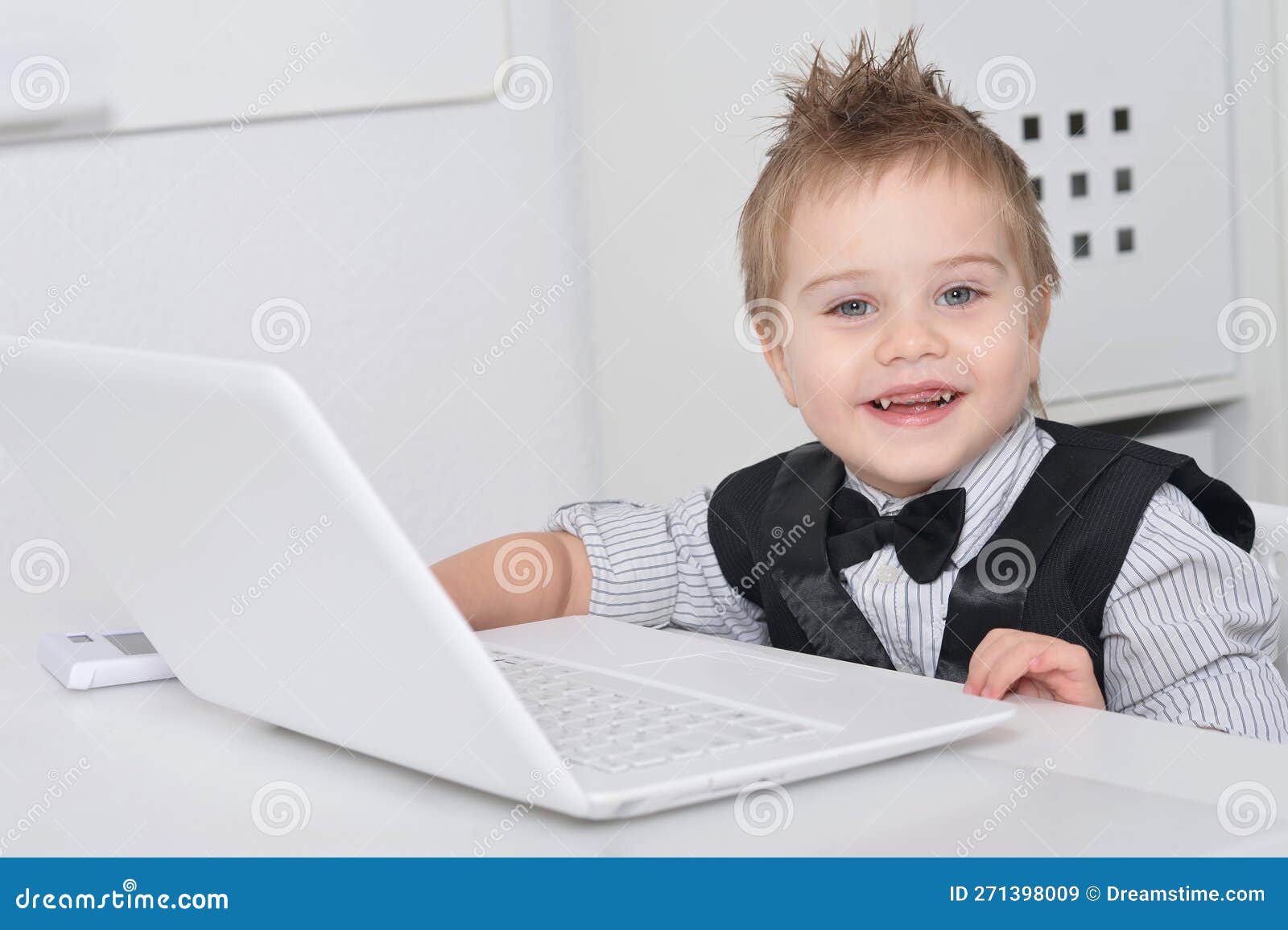 Little Handsome Boy Sits with a Computer Stock Image - Image of sitting ...