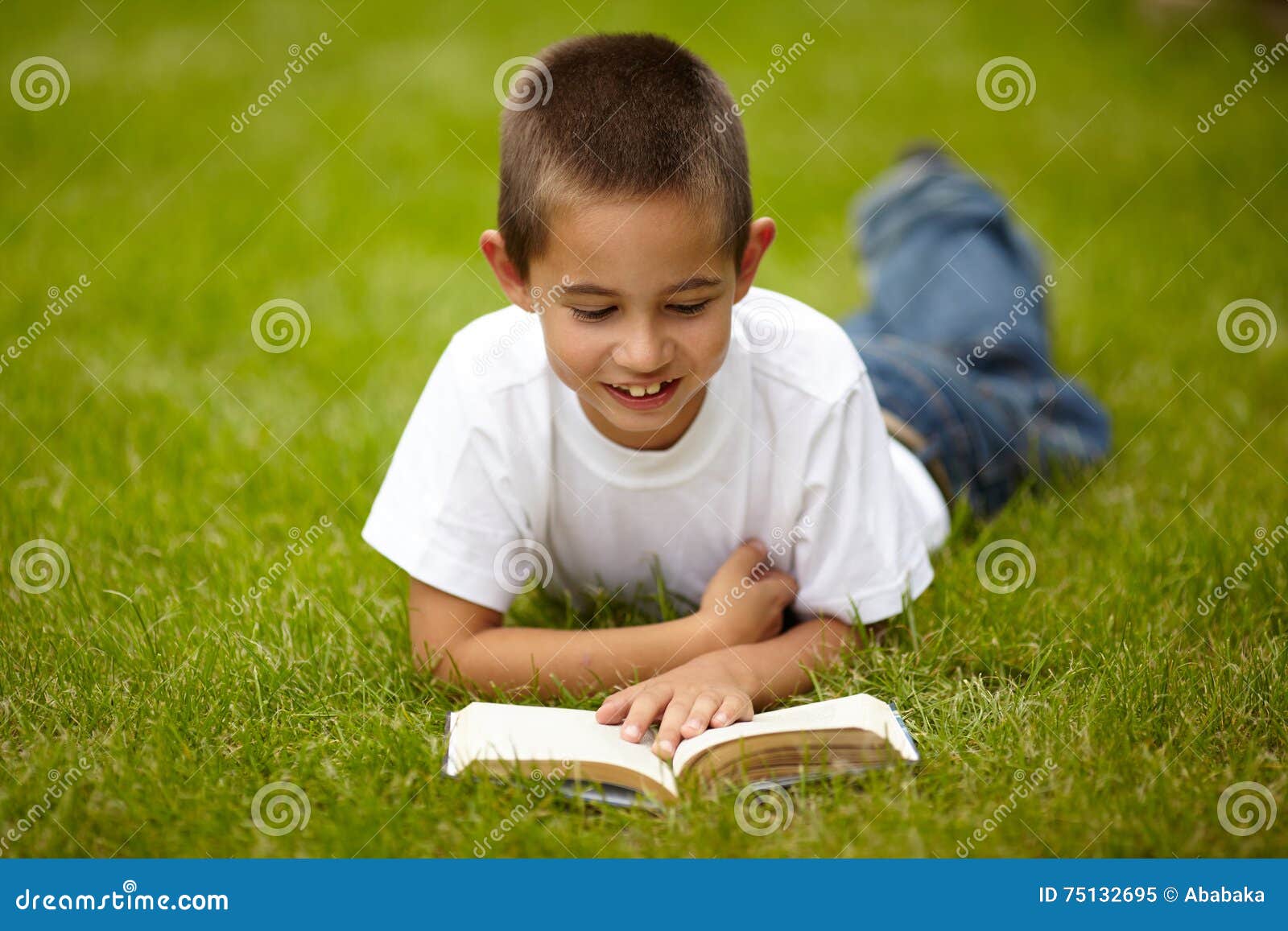 Little Happy Boy Reading Book Stock Image - Image of grass, outdoor ...