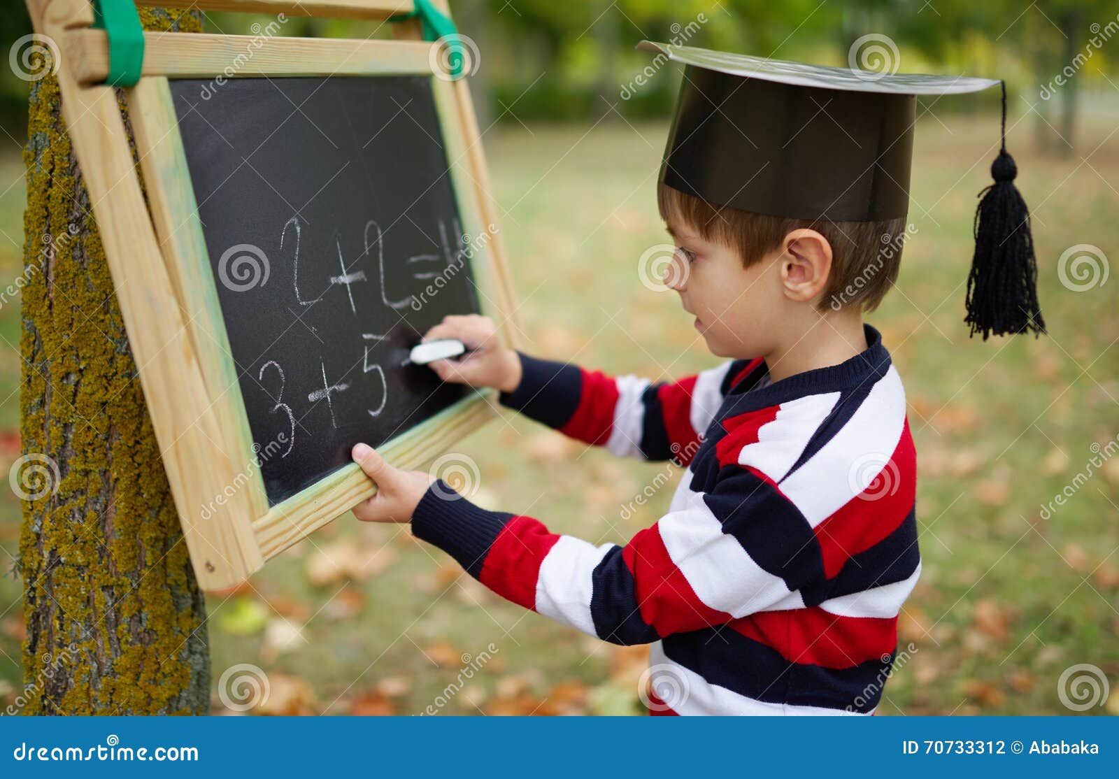 Little Happy Boy Writing on Blackboard Stock Photo - Image of back ...