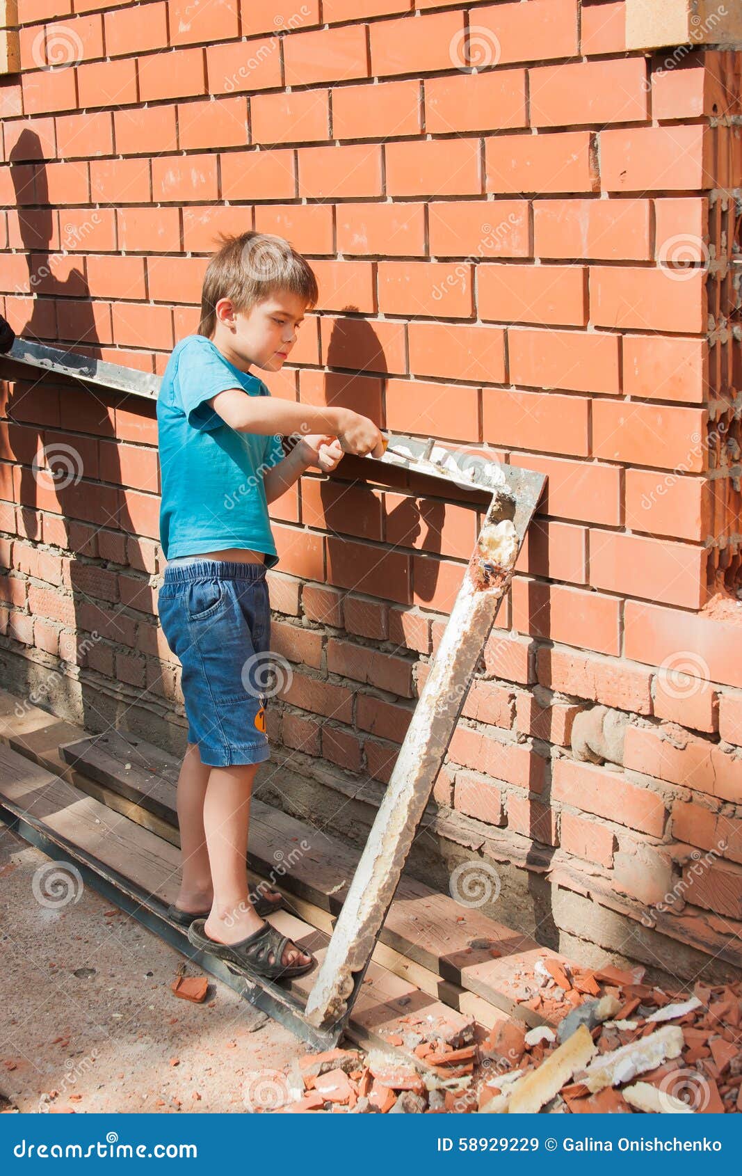 Little helper, boy at work stock image. Image of scope - 58929229