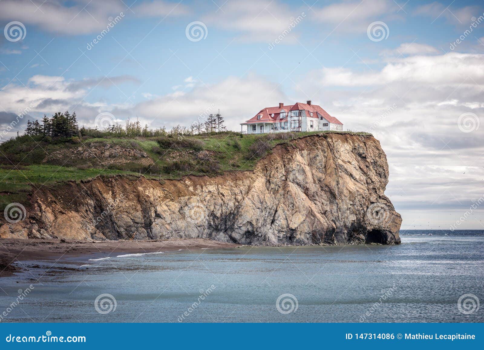 Little house on a cliff stock photo. Image of ocean - 147314086