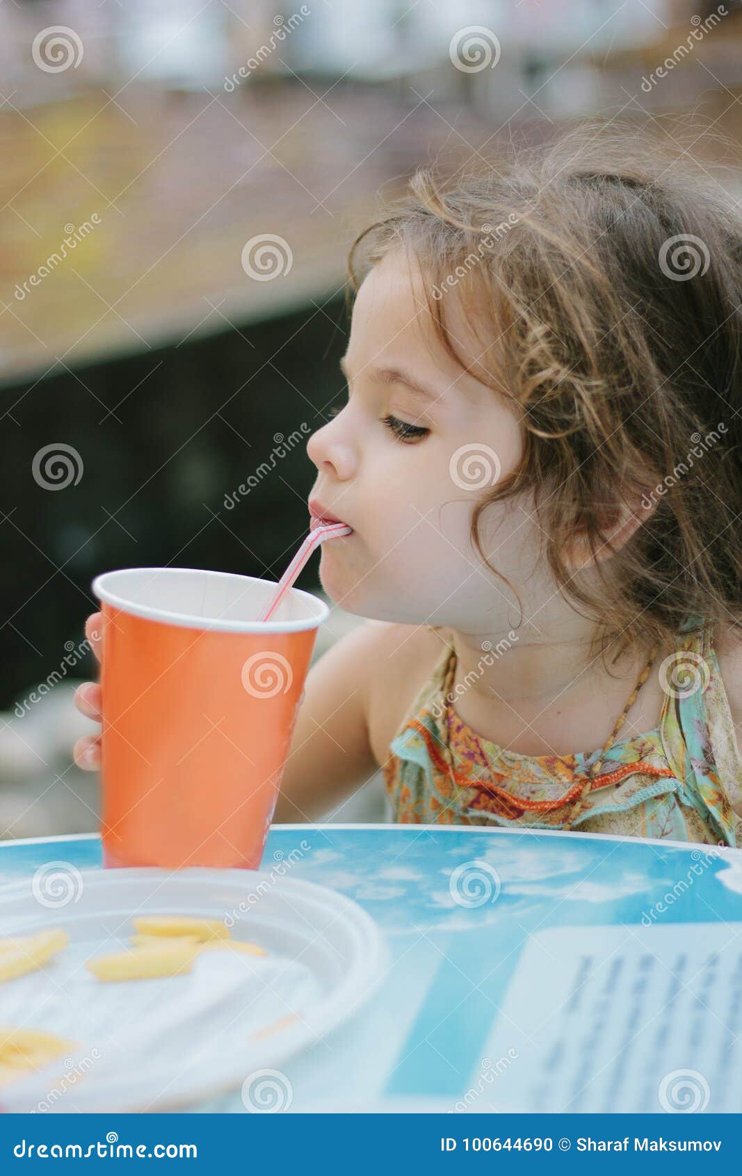 Little Kid Drinks Cola at the Cafe or Restaurant Stock Photo - Image of ...