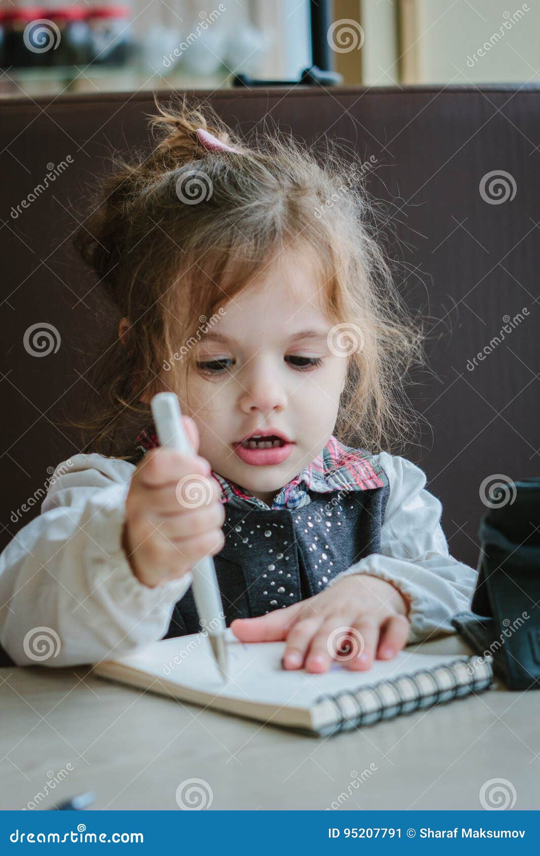 Little Kid Girl Writing or Drawing with Pen in Scetch Book Stock Image ...