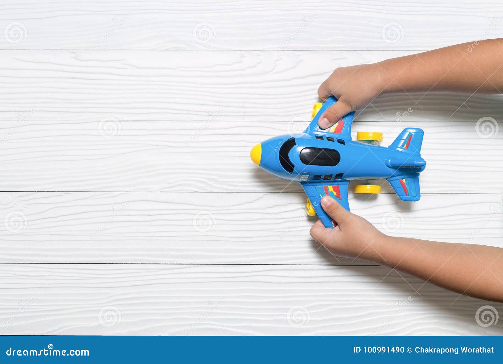 Little Kid Holding Blue Airplane Toy. Imagination Concept Stock Photo ...