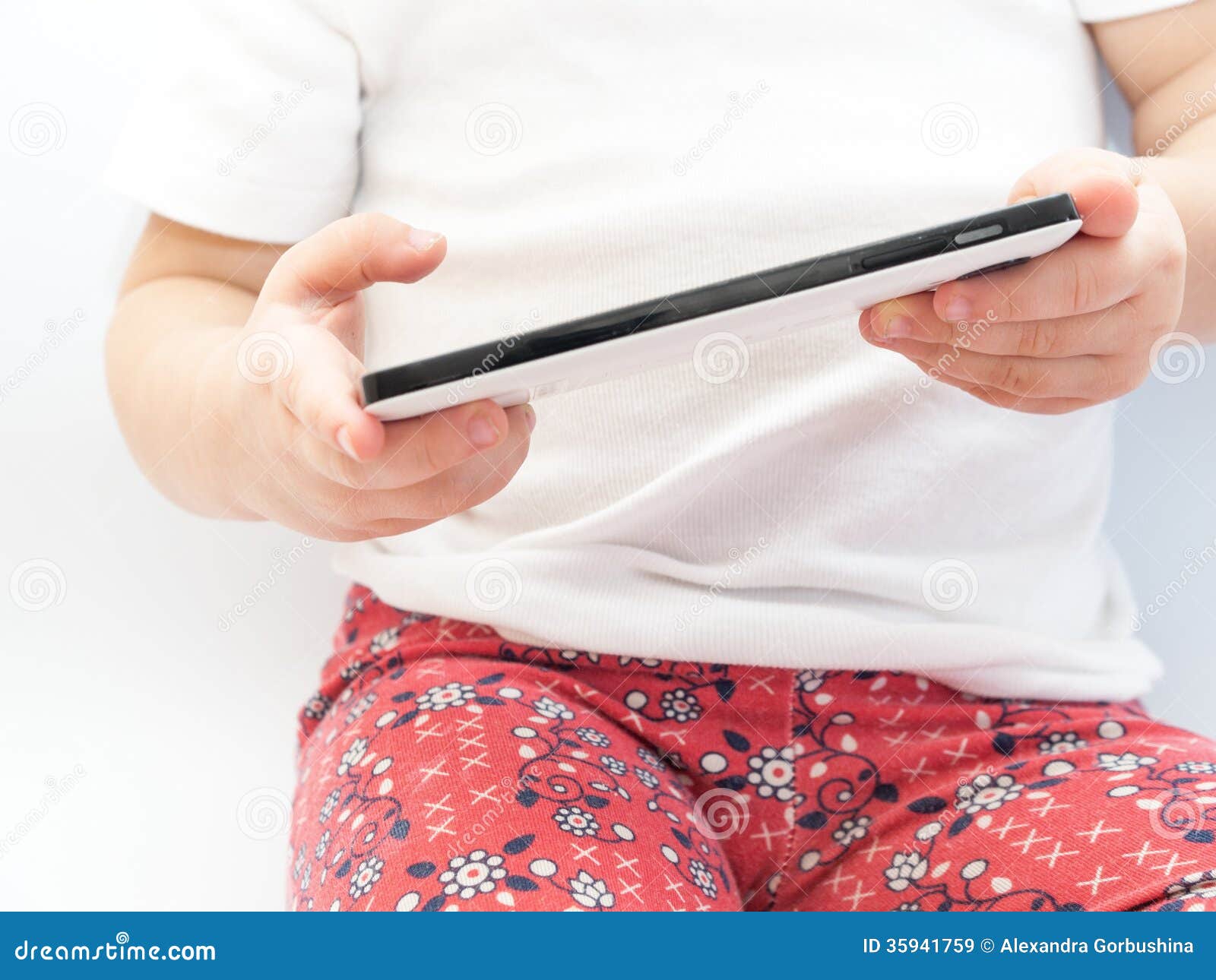 Little Kid Holding Smartphone in His Hands Stock Image - Image of alone ...