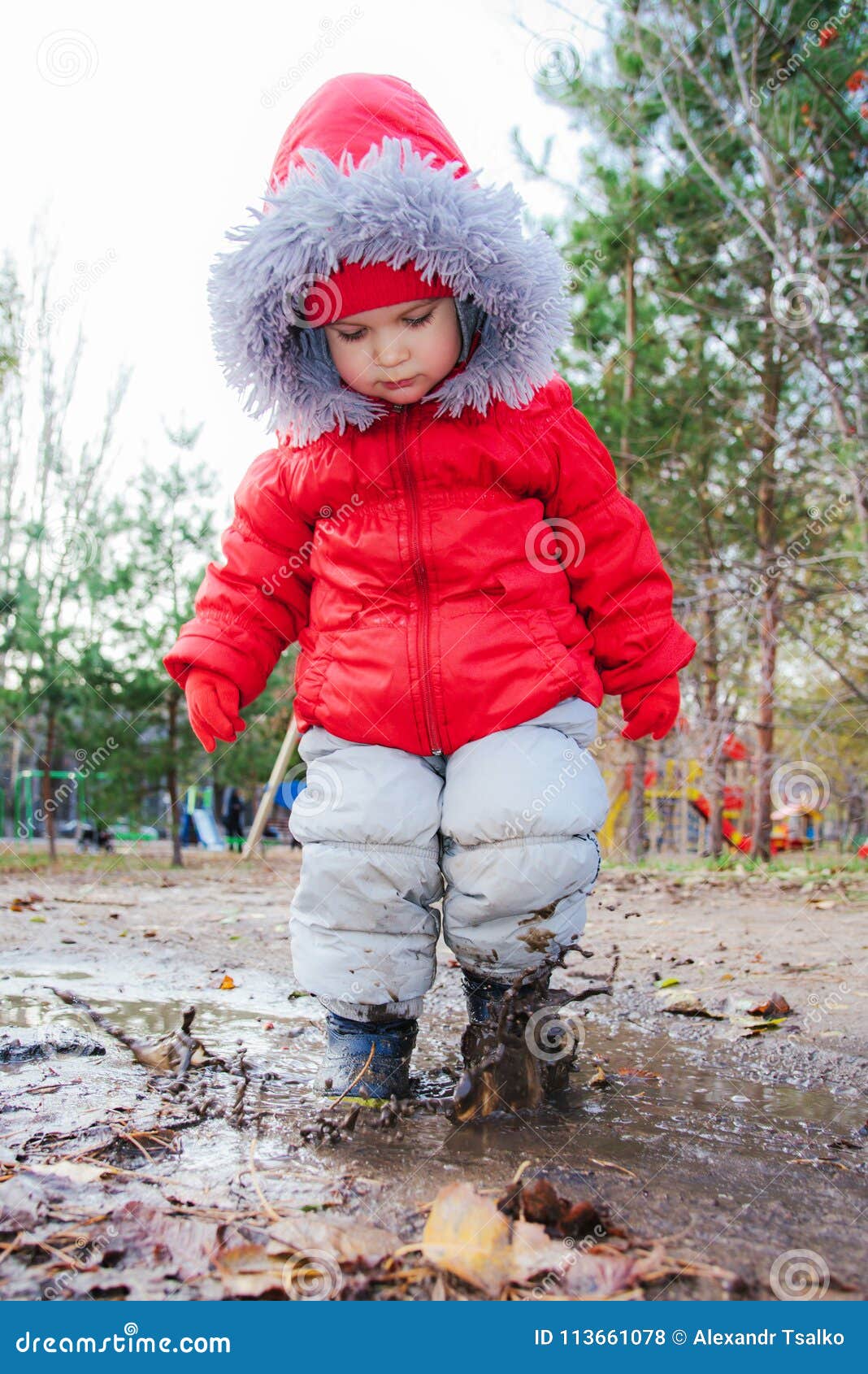 Little Kid Jumping in a Puddle in the Park Stock Photo - Image of funny ...