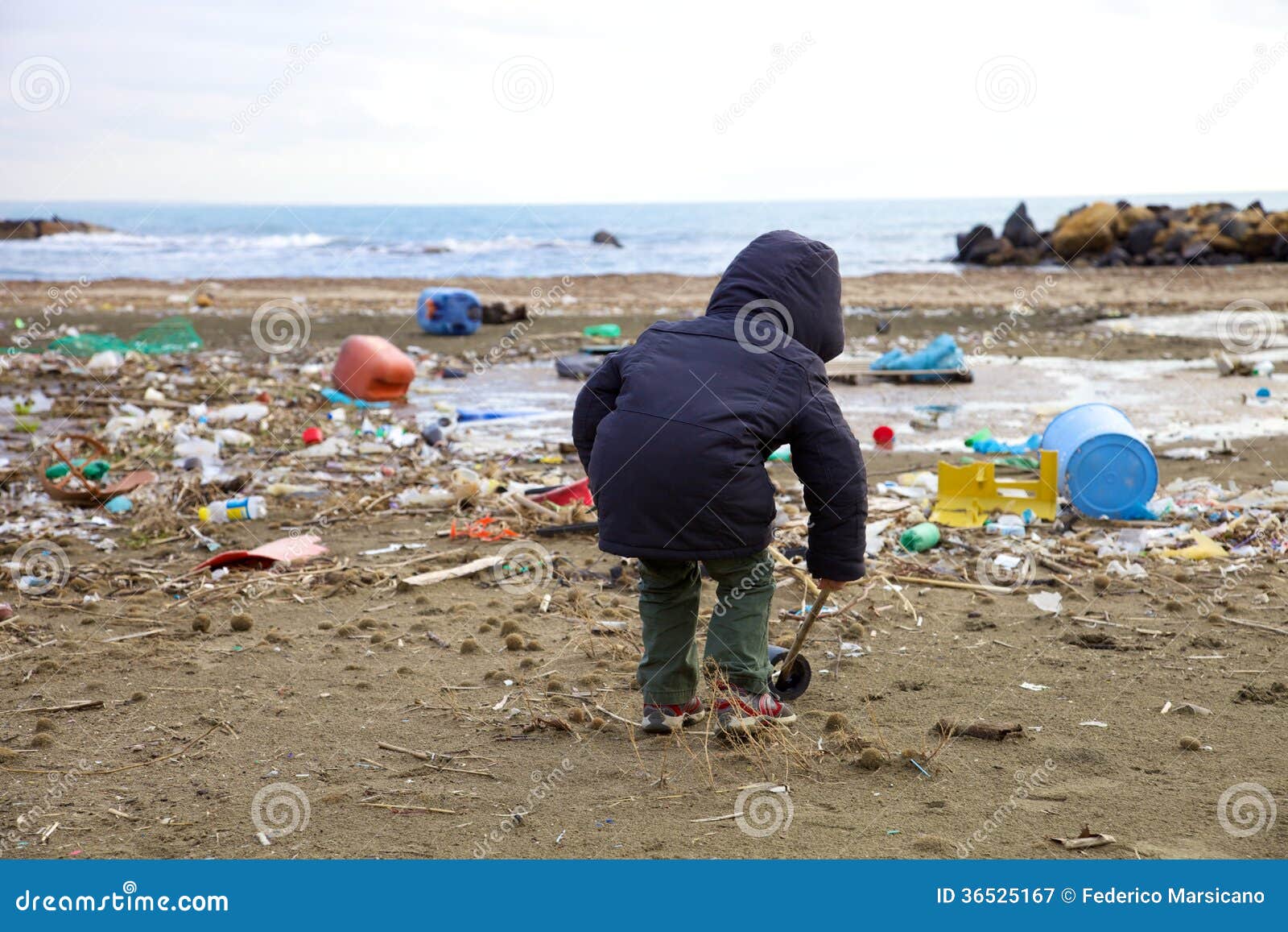 Little Kid Playing on Beach with Dirt Disaster and Danger Stock Image ...