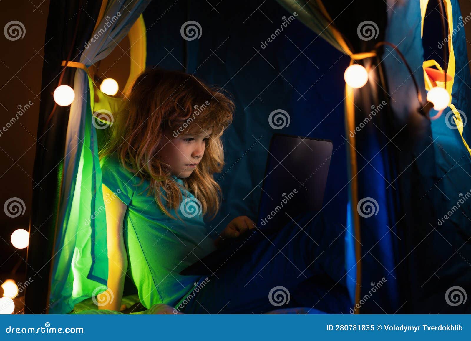 Little Kid Using Laptop by Night, Child Boy Illuminated by the Blue ...