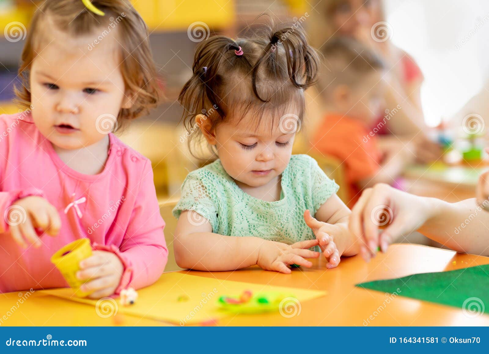Little Kids Having Fun Together with Colorful Modeling Clay at Daycare ... Little Kids Having Fun Together with Colorful Modeling Clay at Daycare ...