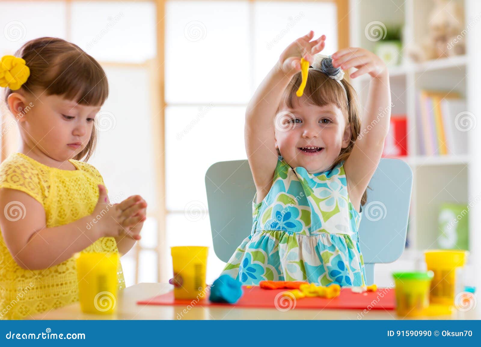 Little Kids Having Fun Together with Colorful Modeling Clay at Daycare ... Little Kids Having Fun Together with Colorful Modeling Clay at Daycare ...