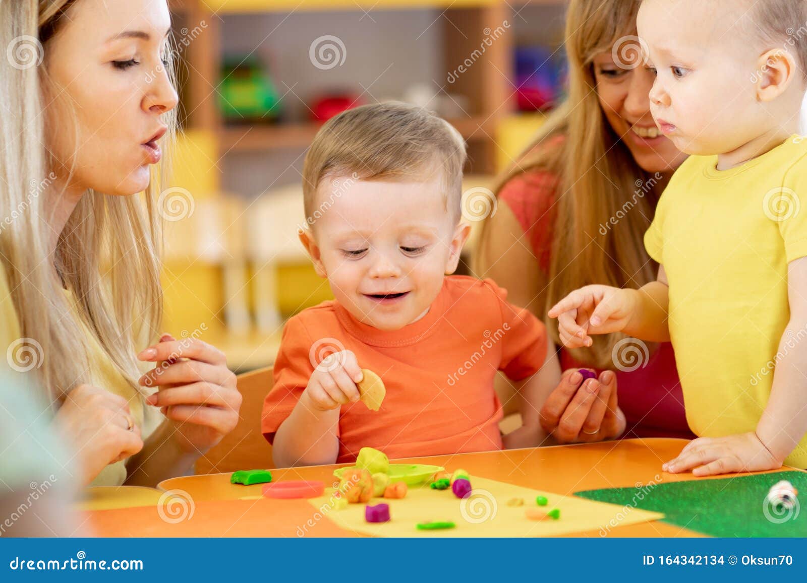 Little Kids Having Fun Together with Moms. Creative Kids Molding at ... Little Kids Having Fun Together with Moms. Creative Kids Molding at ...
