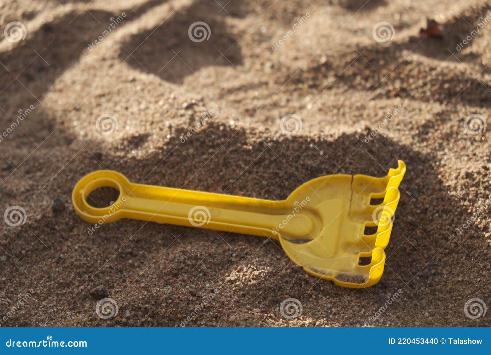 Little Kids Plastic Toy Rake Lie in the Sandbox Stock Photo - Image of ...