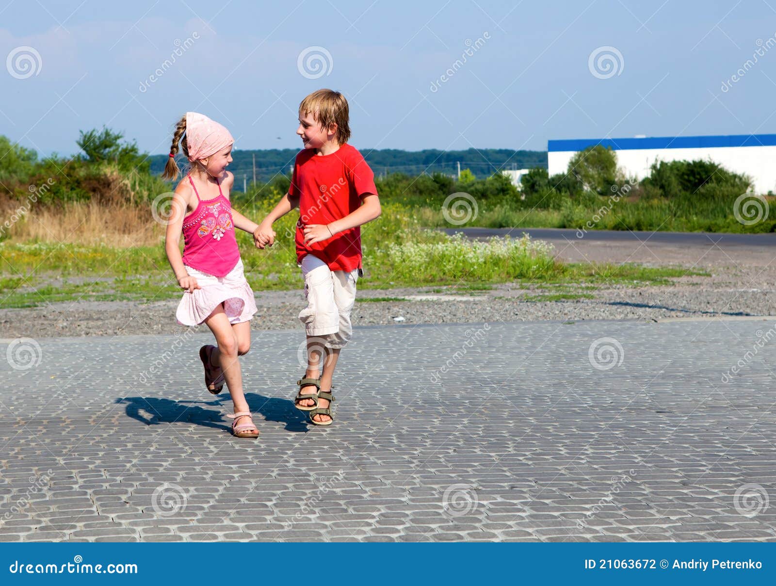 Little Kids Running in Street Stock Photo - Image of carefree ...