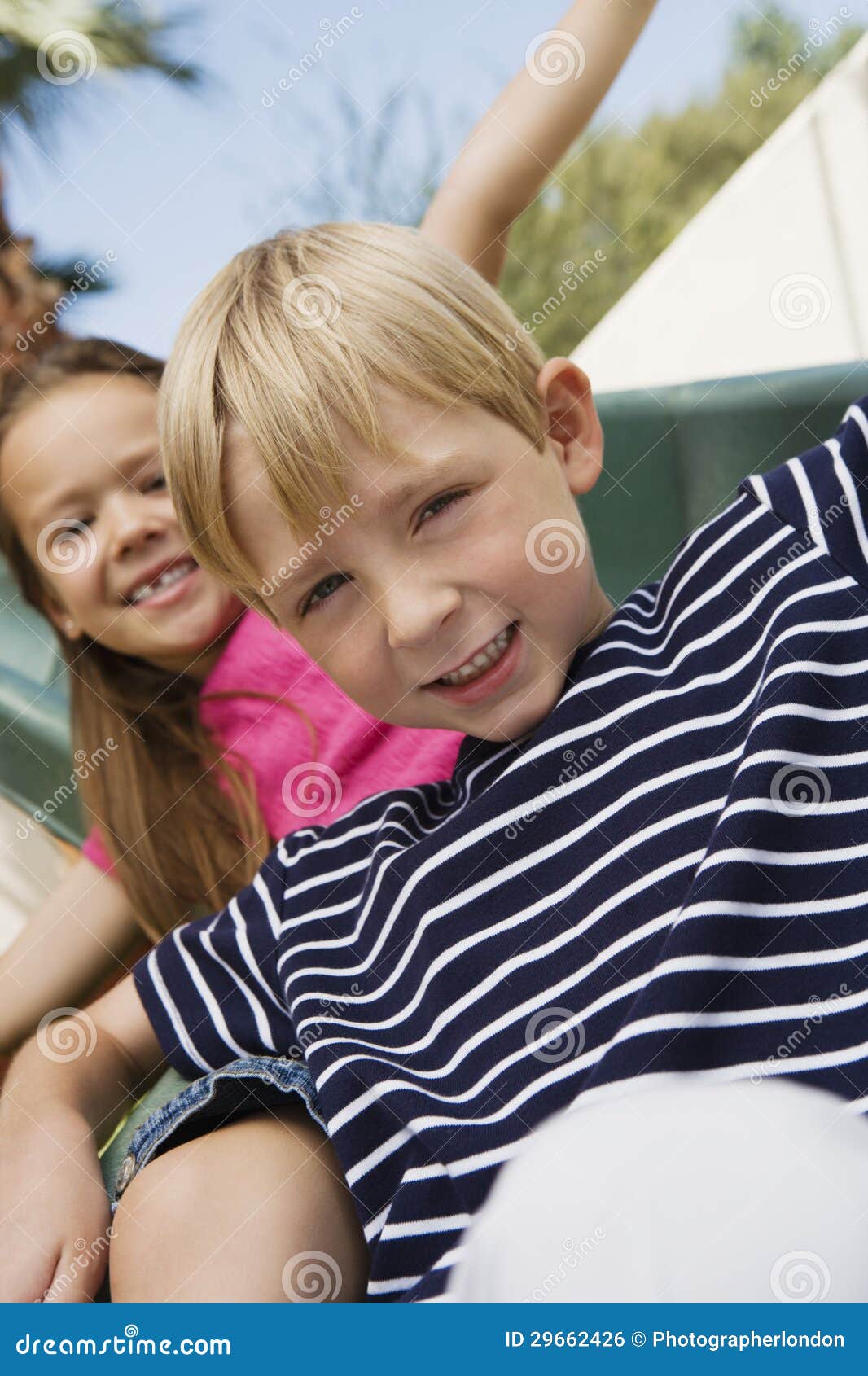 Little Kids on a Slide stock photo. Image of child, cheerful - 29662426