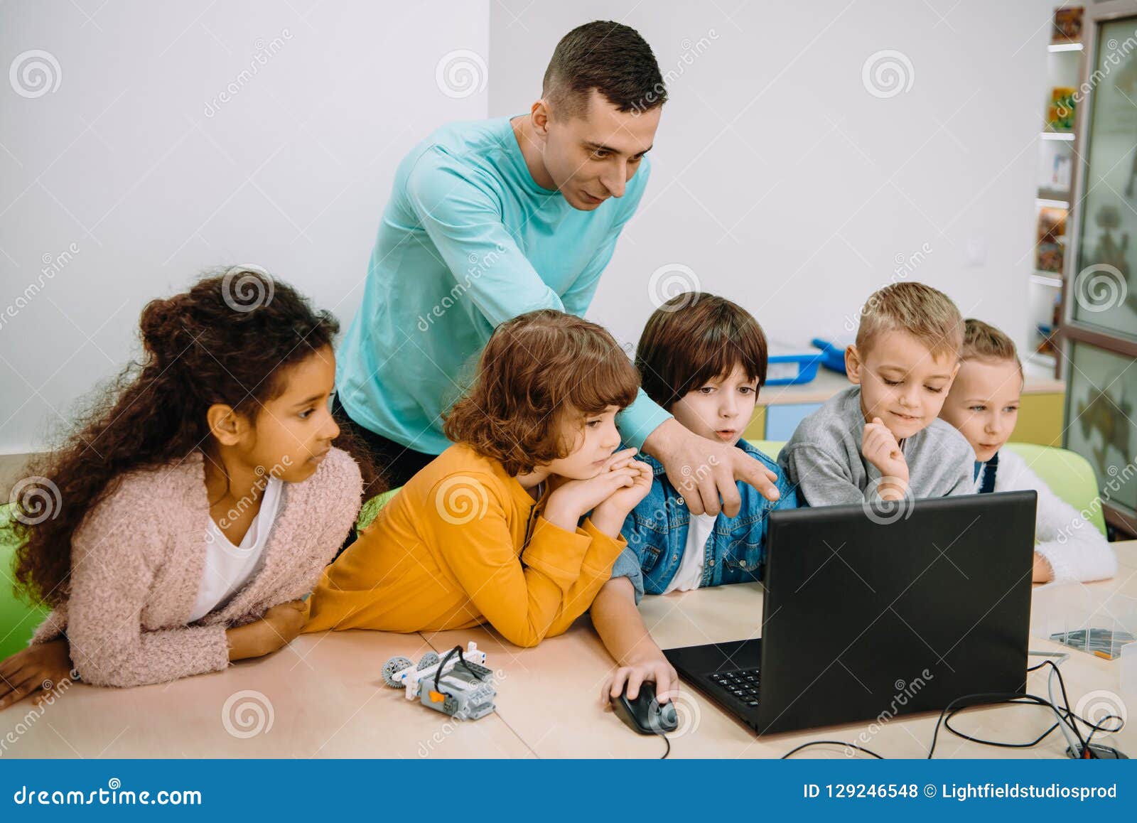 Little Kids Working with Teacher Stock Photo - Image of gesturing ...