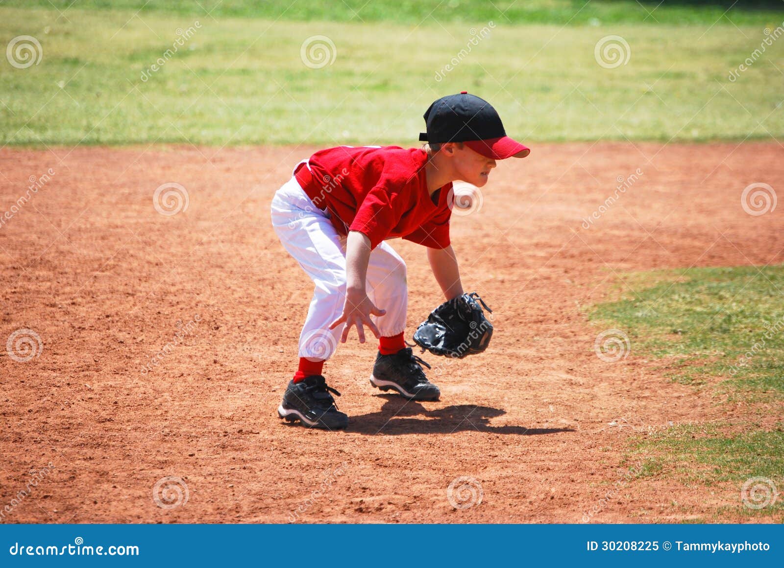 Little league short stop stock image. Image of batter - 30208225