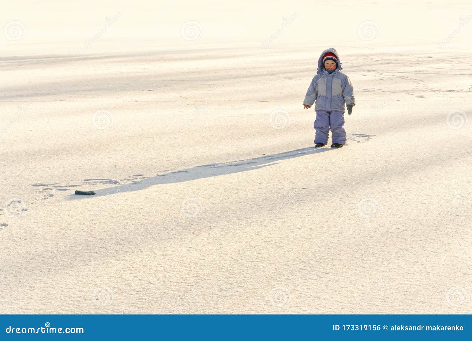 Little Lonely Boy in Winter on Ice in the Snow Stock Photo - Image of ...