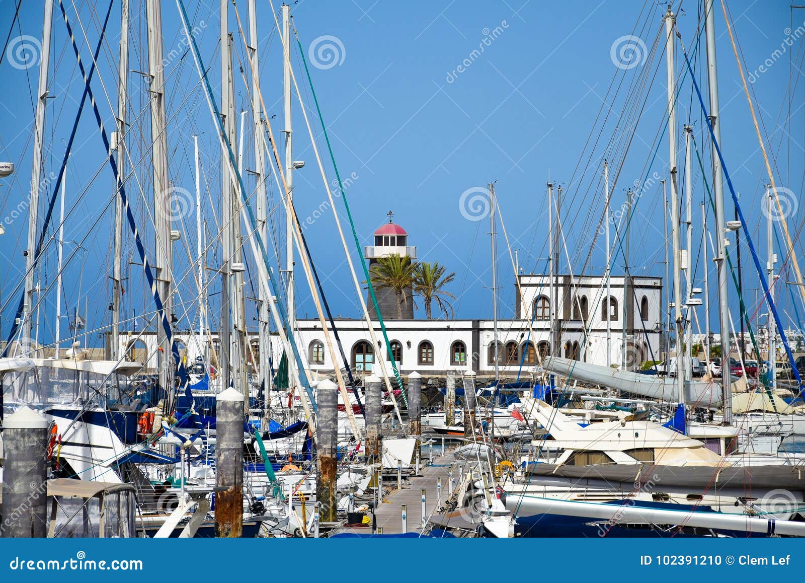 Marina and lighthouse editorial image. Image of little - 102391210