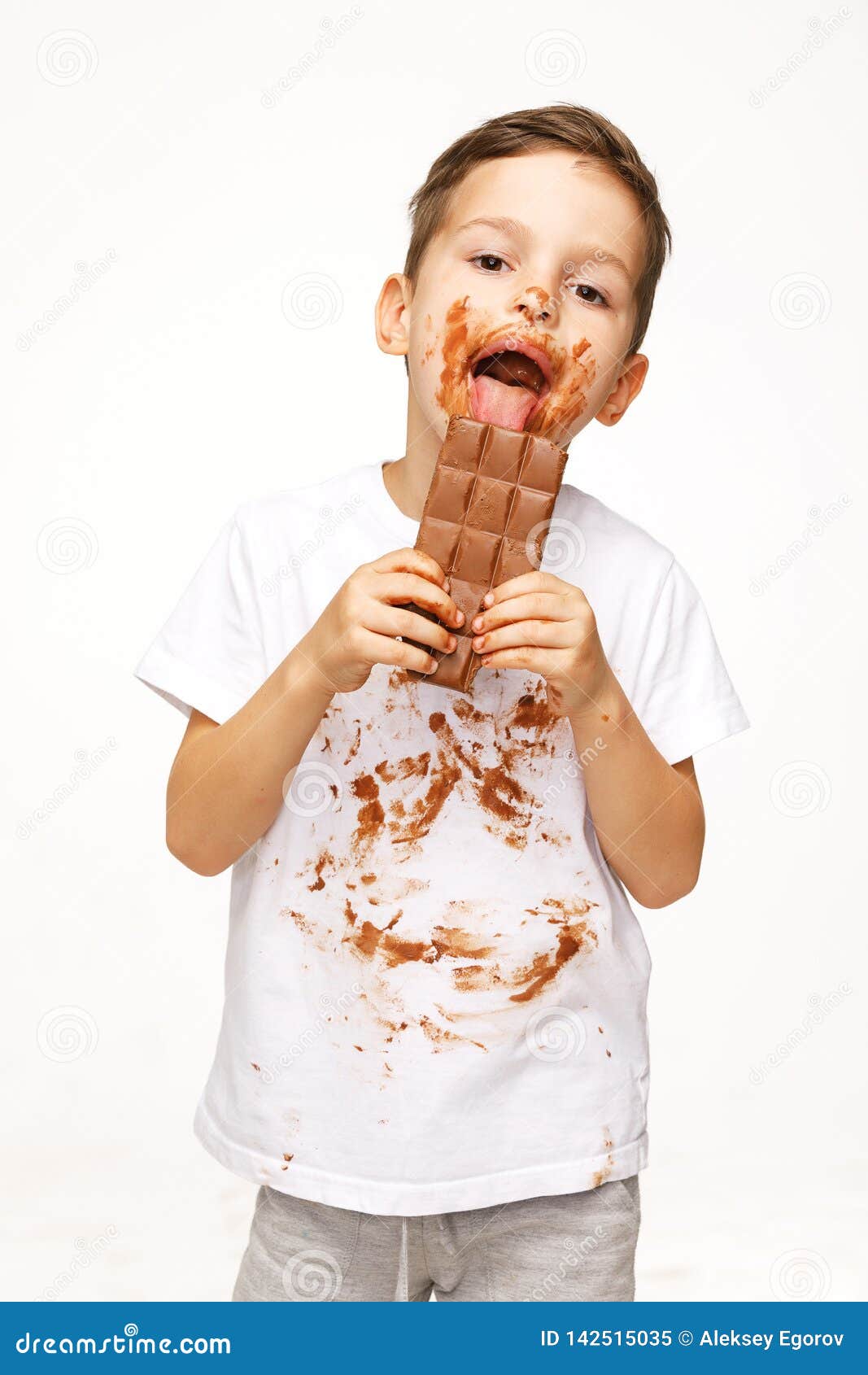 Little Messy Boy Is Eating Chocolate Studio Shot Stock Image - Image of ...