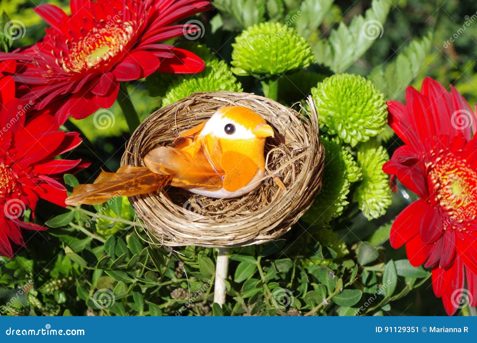 Little Orange Bird in a Nest among Spring Flowers Stock Image - Image ...