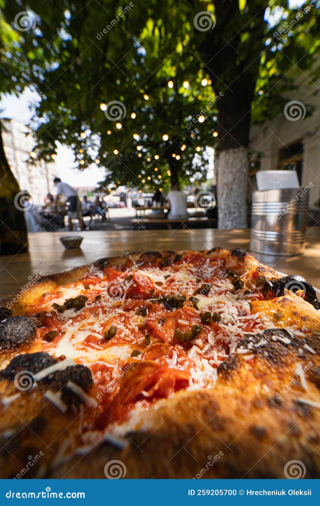 Little Pizza on a Table in a Street Cafe Stock Photo - Image of table ...