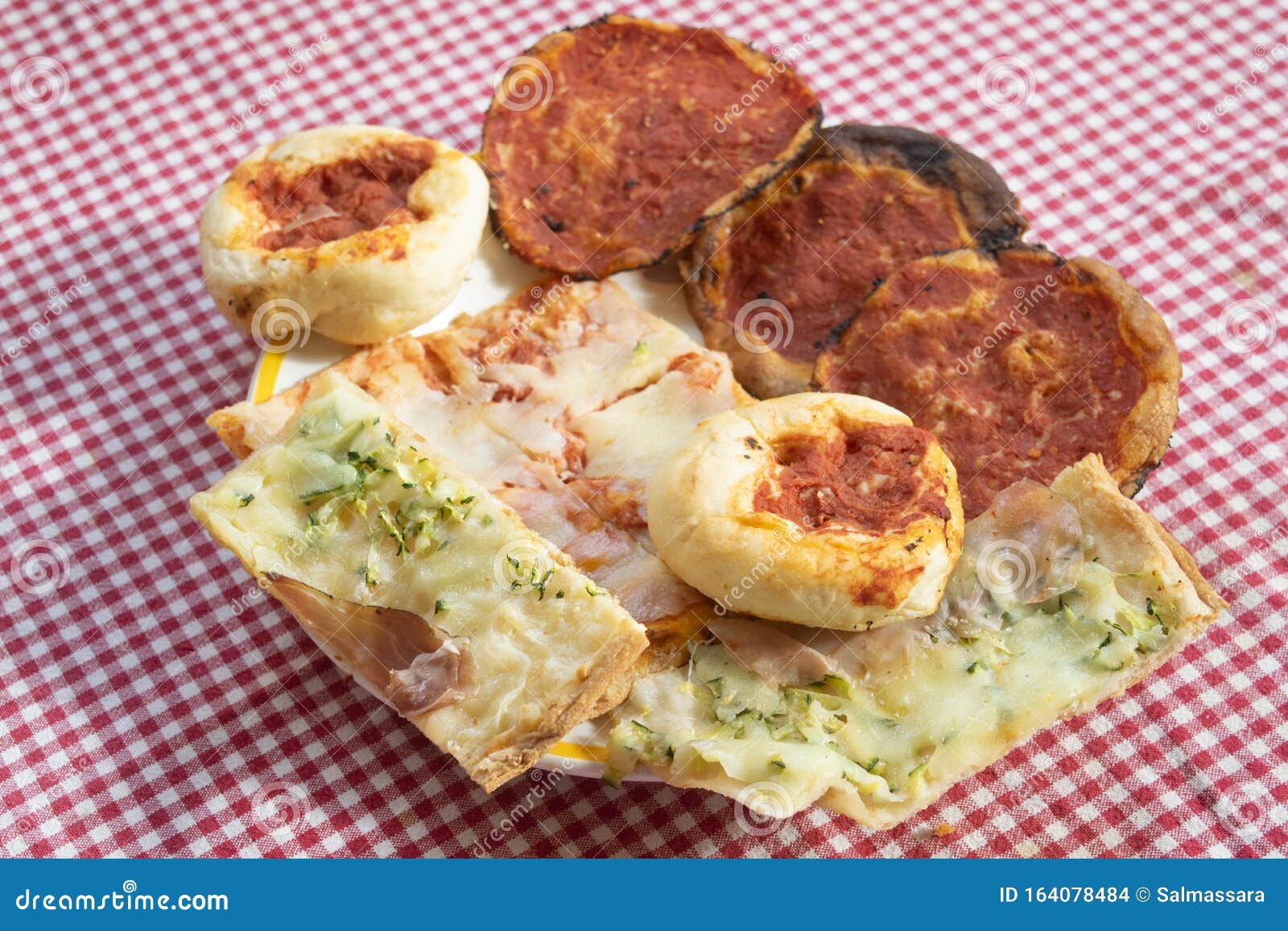 Little Pizzas and Variety of Pizza by the Slice Stock Photo - Image of ...
