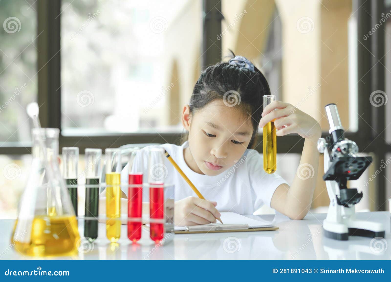 Preschool Girl is Interested in Laboratory Lesson, Taking Notes on Book ...