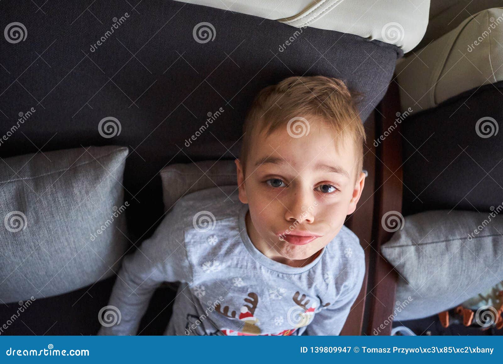 Little Pretty Boy Resting on the Sofa Stock Image - Image of meditates ...