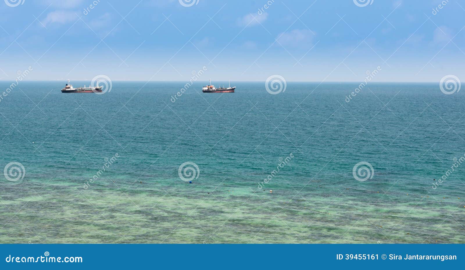 Little raft in the sea stock image. Image of blue, clouds - 39455161
