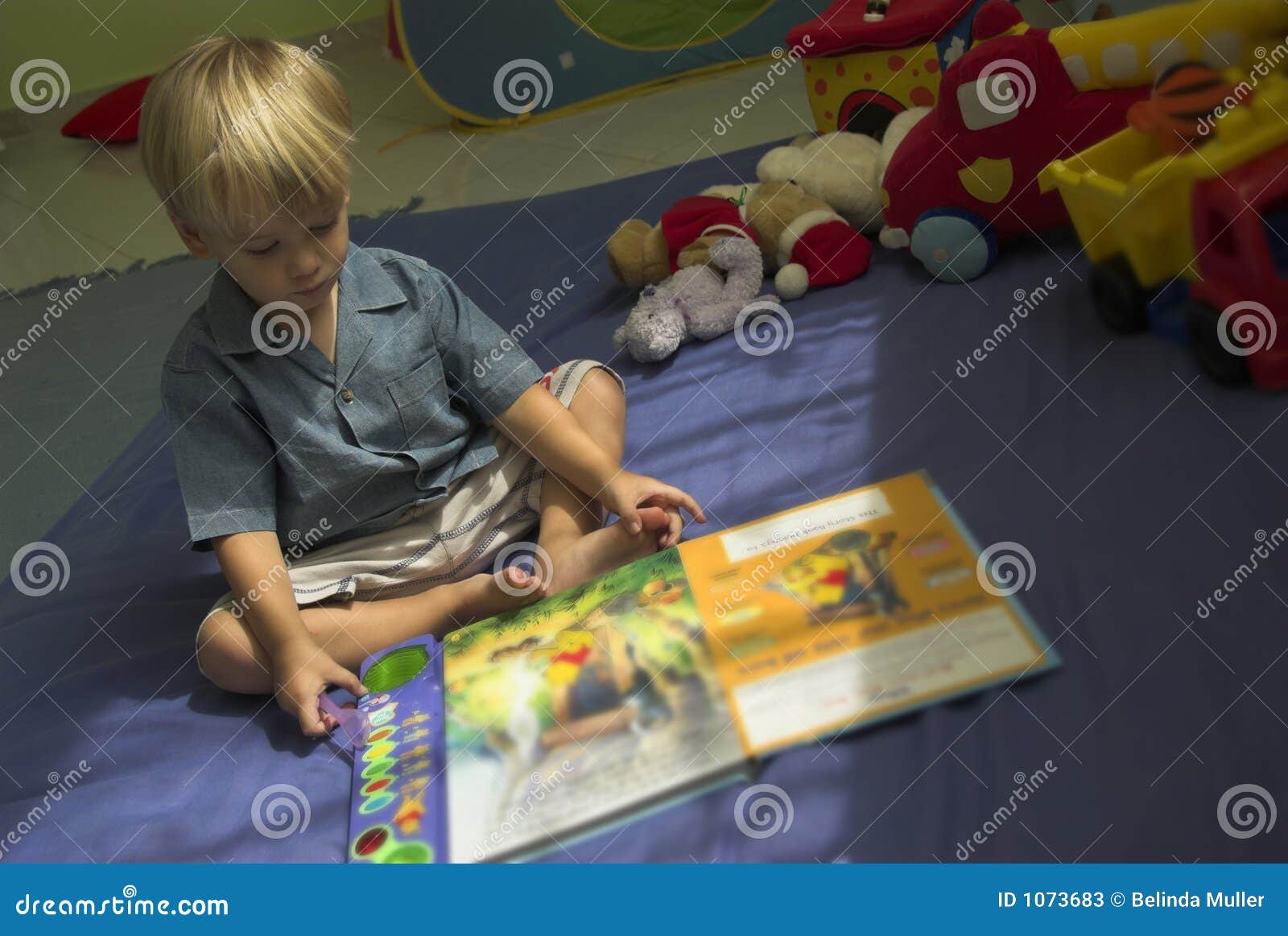 A little reading stock image. Image of happy, bedroom - 1073683
